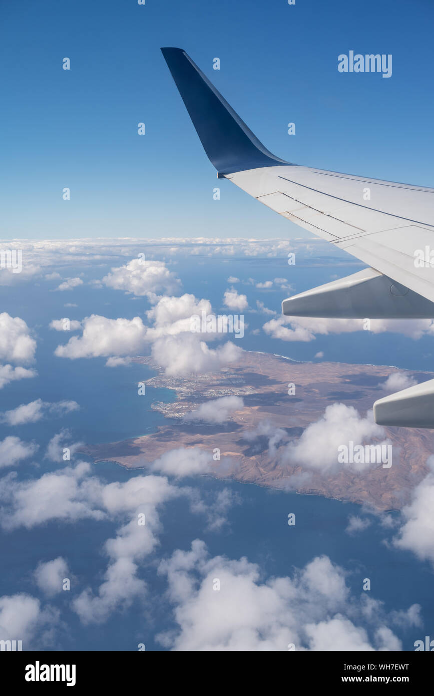Plane wing from inside an airplane Stock Photo - Alamy