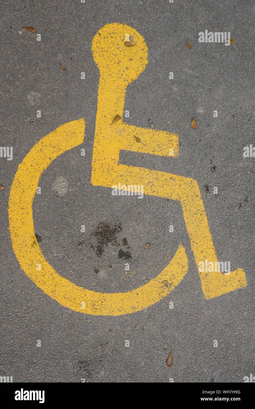Yellow disabled sign hi-res stock photography and images - Alamy