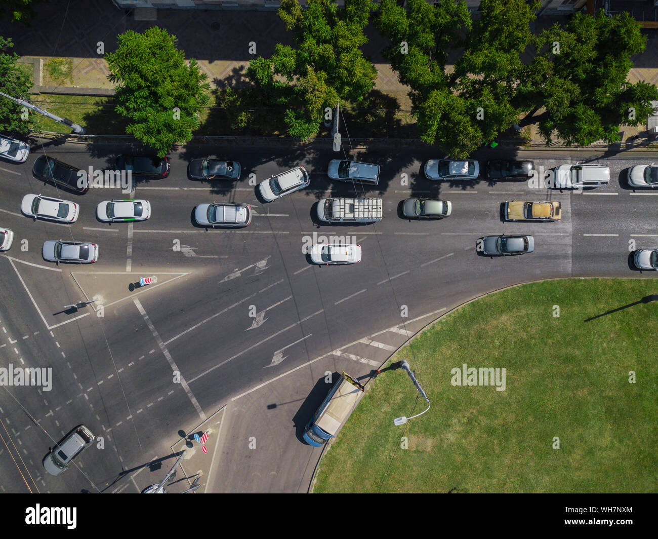 Abstract overhead aerial view of traffic driving navigating through ...