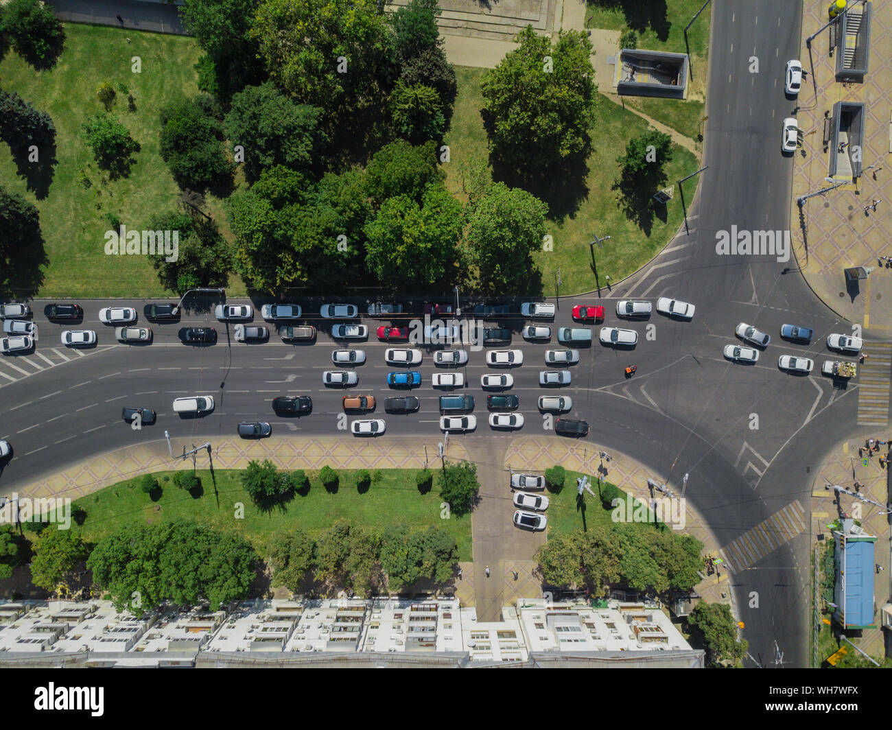 Abstract overhead aerial view of traffic driving navigating through ...