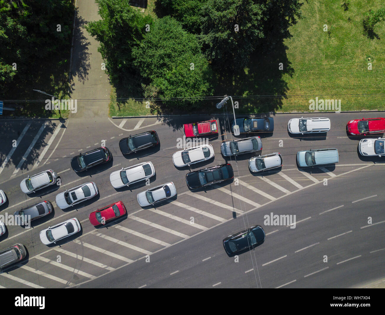 Abstract overhead aerial view of traffic driving navigating through ...