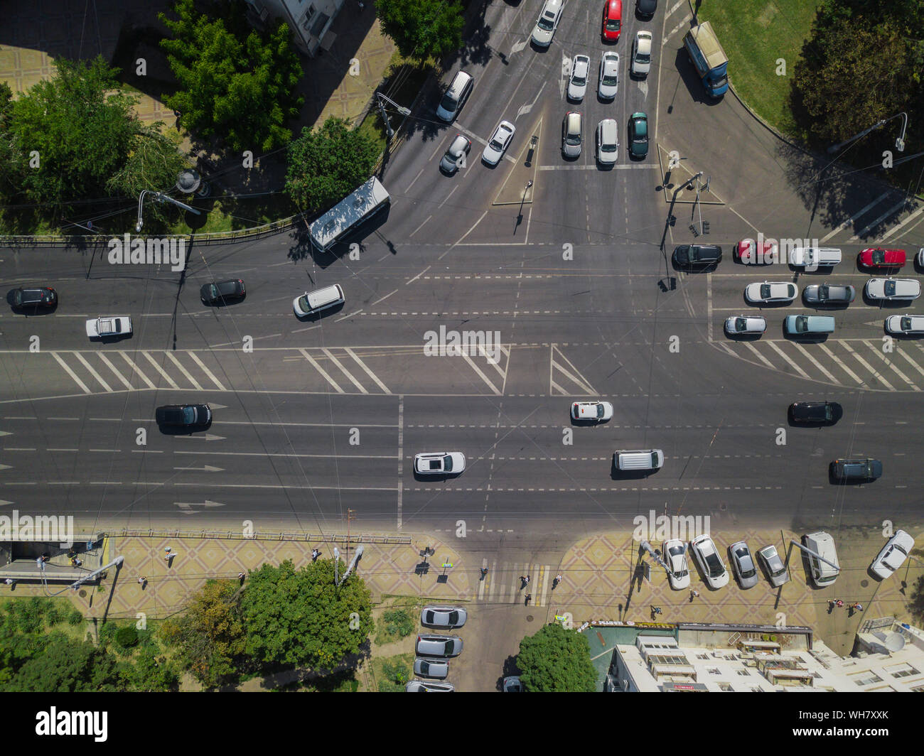 Abstract overhead aerial view of traffic driving navigating through ...