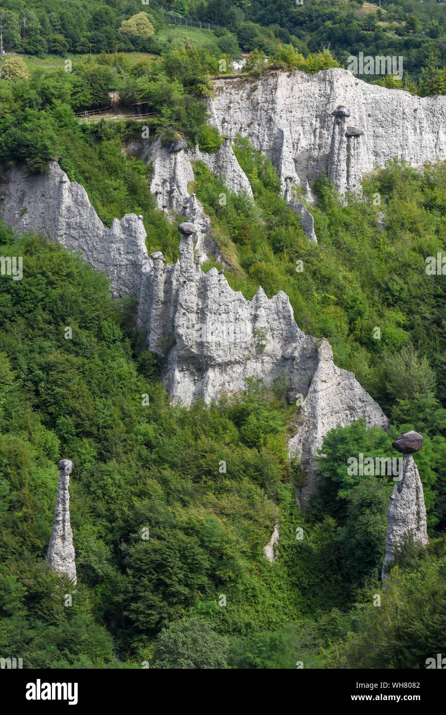 Monument rocks (Chalk Pyramids) of Zone at lake Iseo on Italy Stock ...