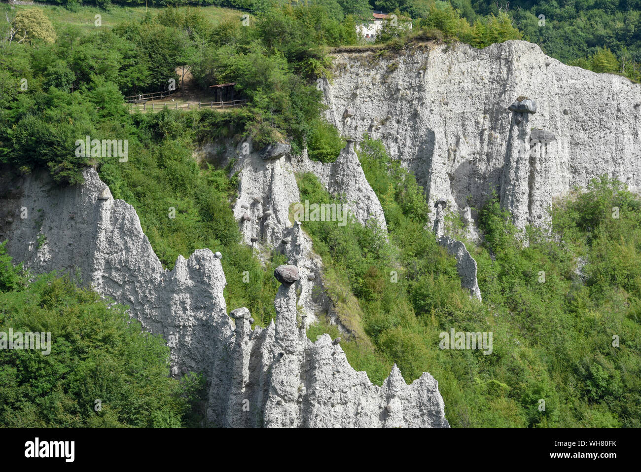 Monument rocks (Chalk Pyramids) of Zone at lake Iseo on Italy Stock ...
