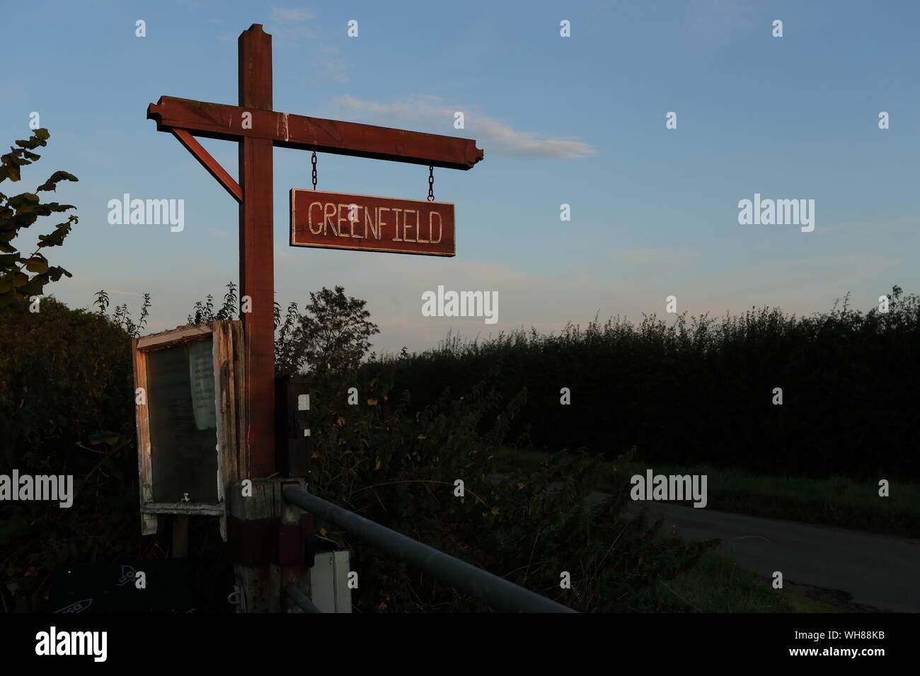 Winterton Greenfield plots sign illuminated by the rising sun Stock ...