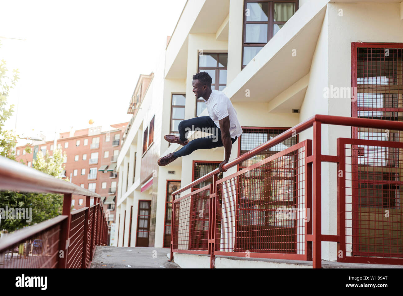 Young person (20 25) jumping across hi-res stock photography and images ...