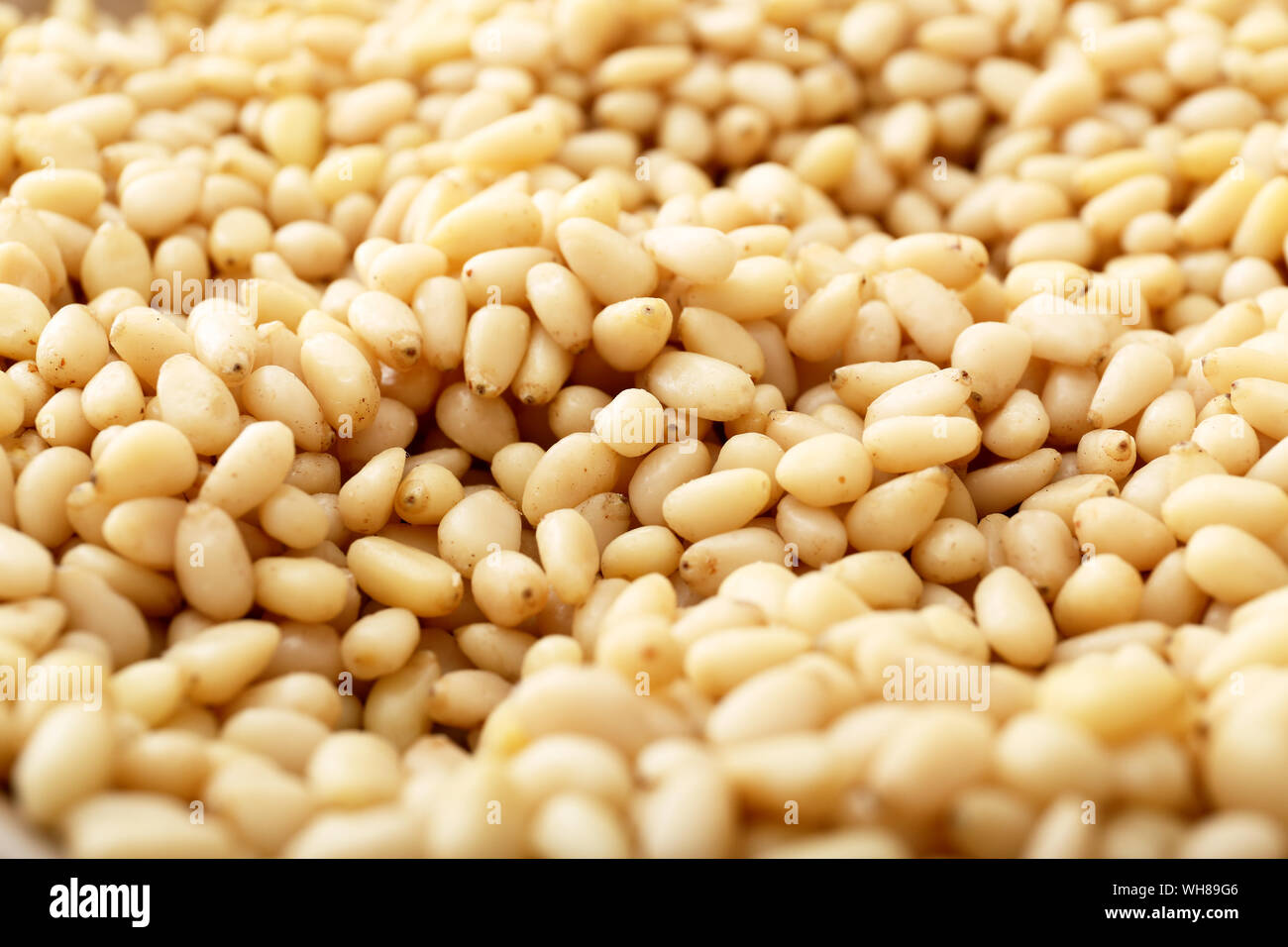 Background texture of shelled pine nuts Stock Photo - Alamy