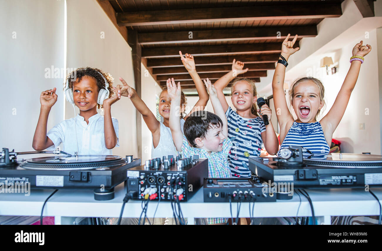 Young friends having a party at the turntable Stock Photo - Alamy