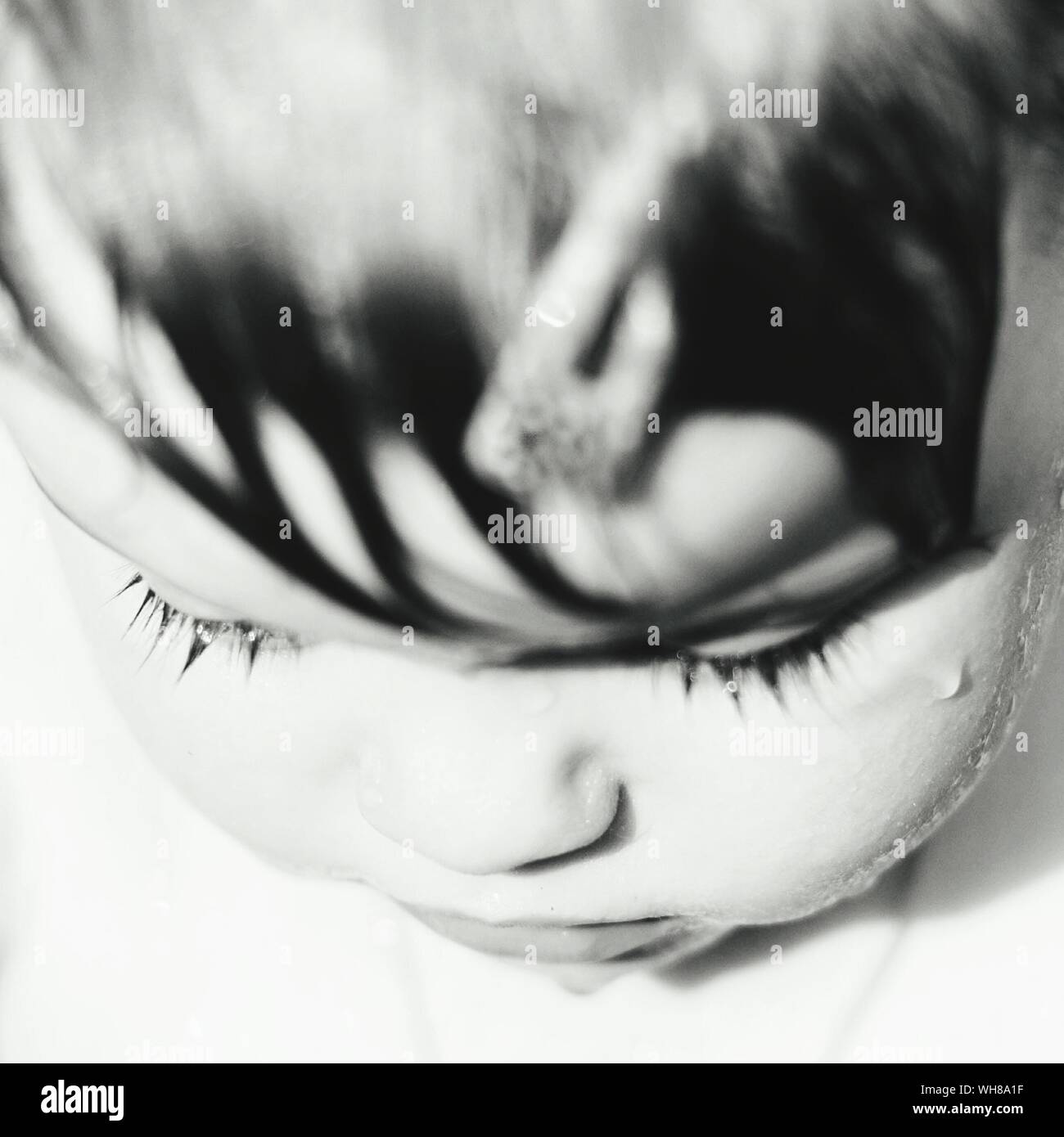 Baby wet face hi-res stock photography and images - Alamy