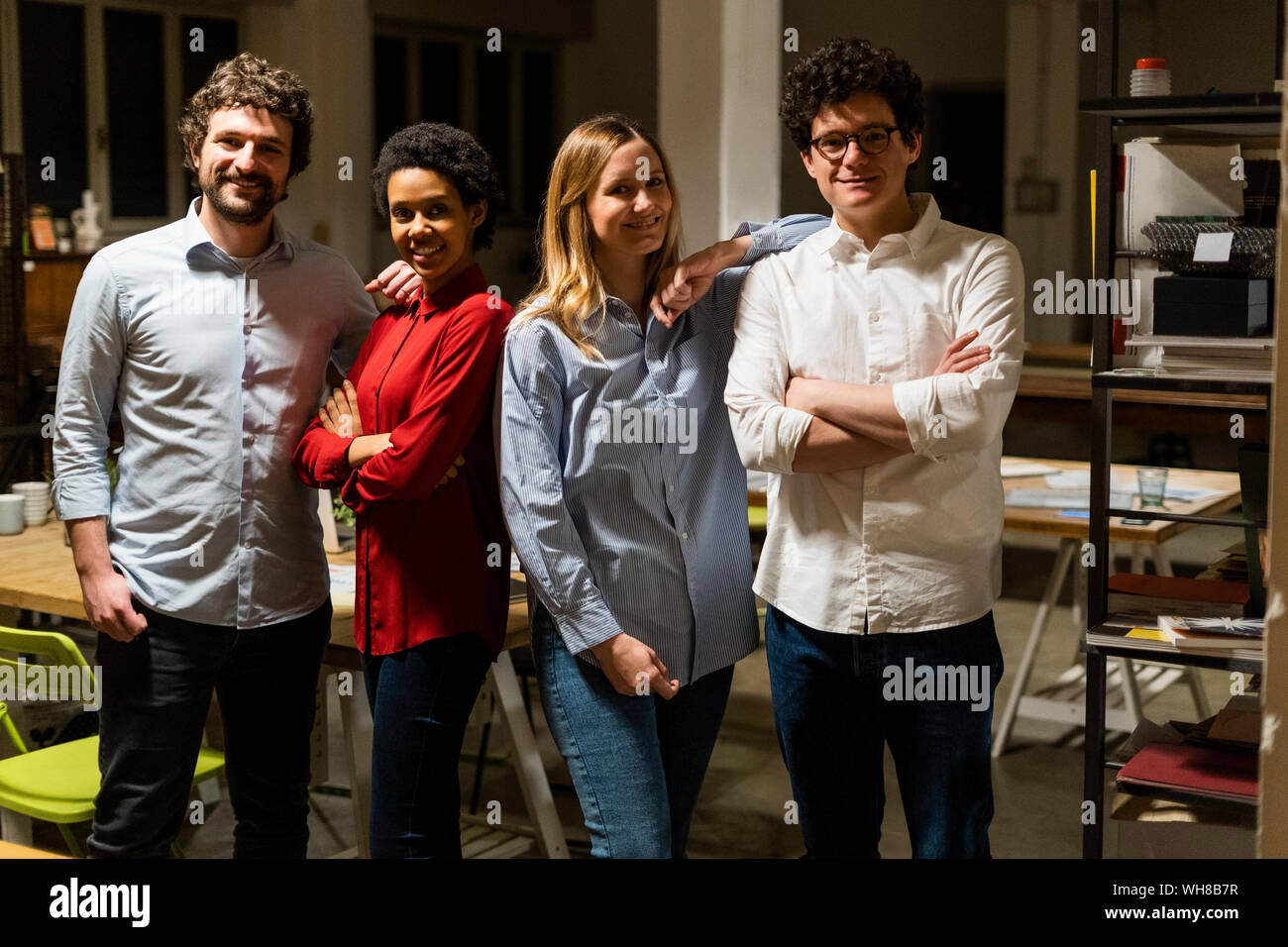 Portrait four business colleagues hi-res stock photography and images ...