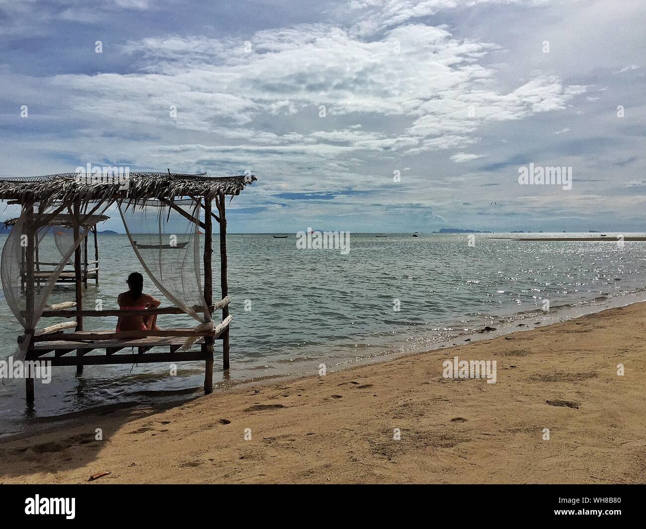 Woman shade beach hi-res stock photography and images - Alamy
