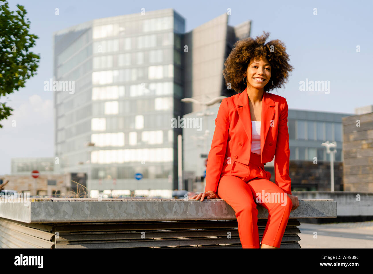 Fashionable woman in red hi-res stock photography and images - Alamy