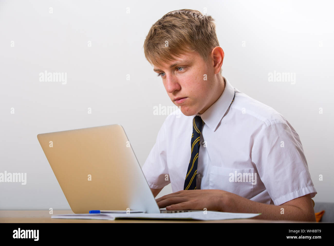 Teen boy uniform hi-res stock photography and images - Alamy