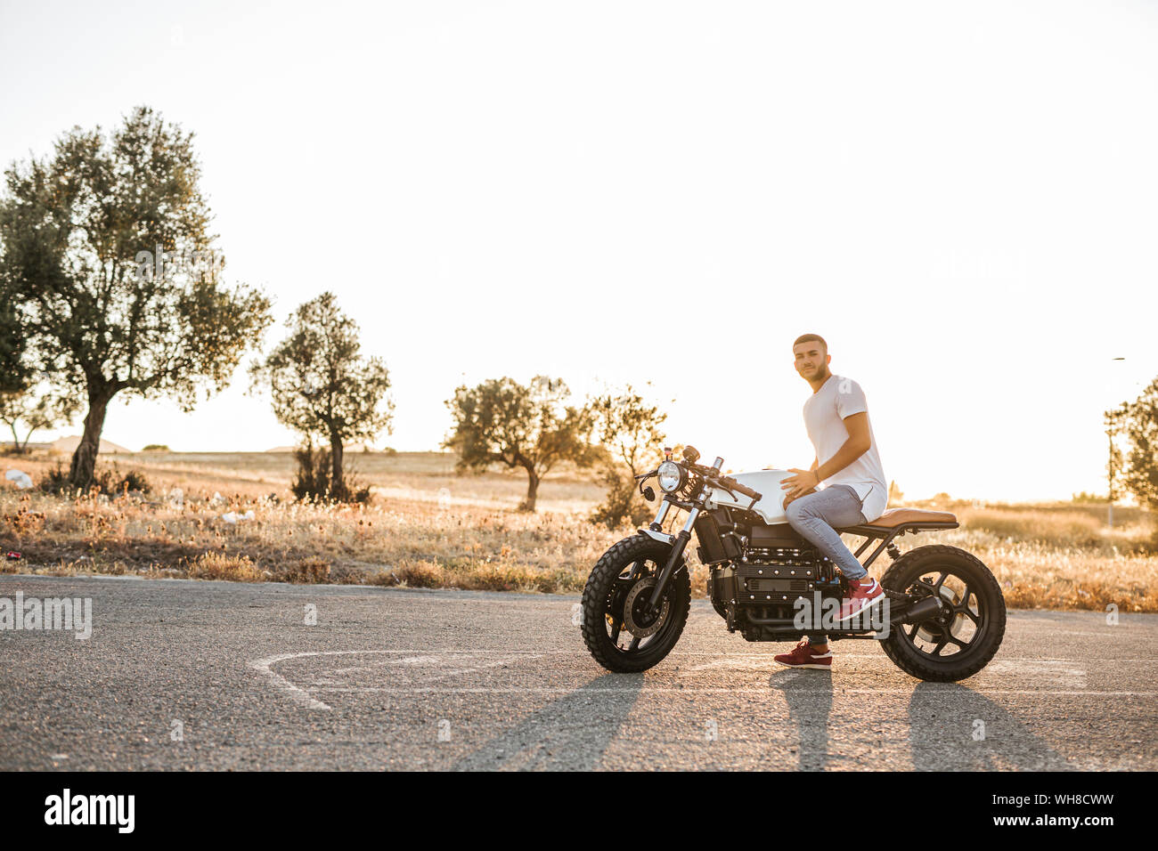 Man on motorbike road hi-res stock photography and images - Alamy