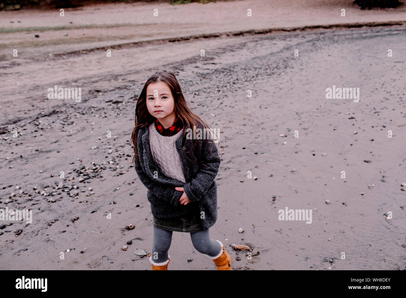 Portrait of little girl at riverside in autumn Stock Photo - Alamy