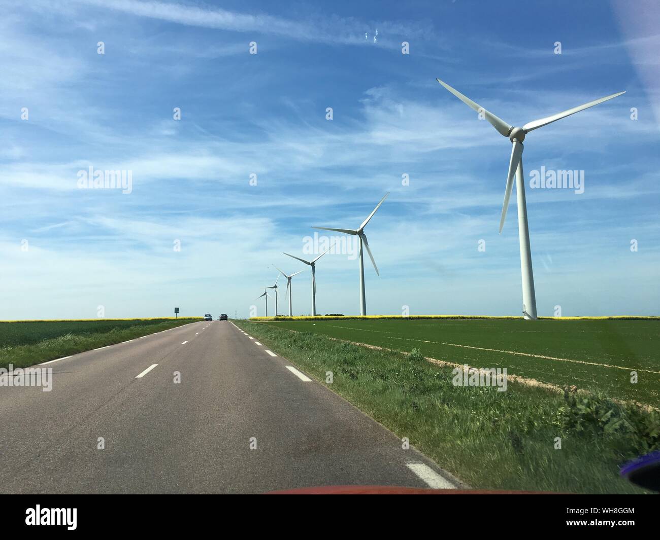 Empty road and wind turbine hi-res stock photography and images - Alamy