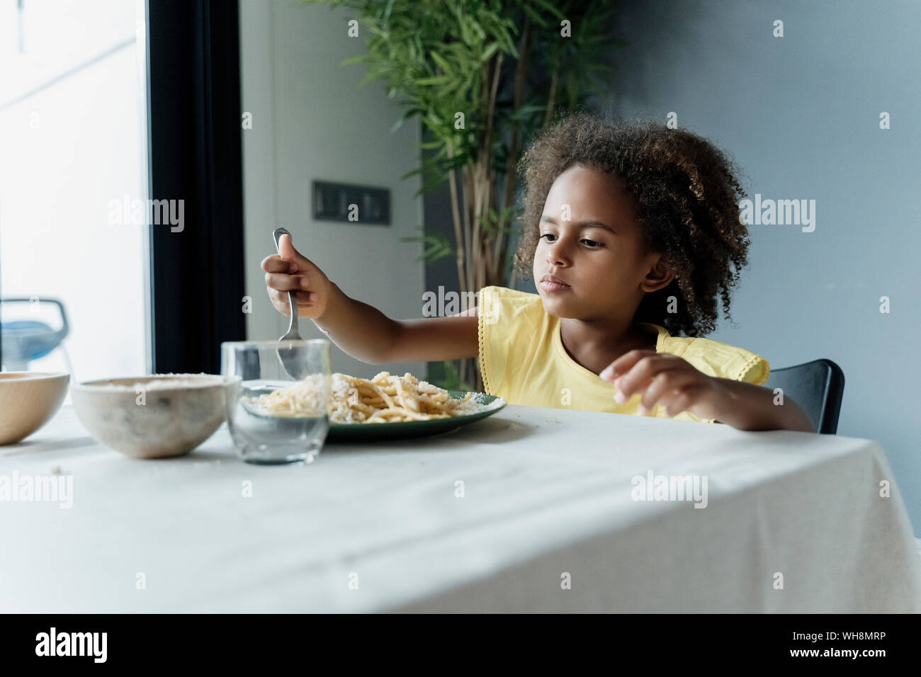 Girl Setting The Table