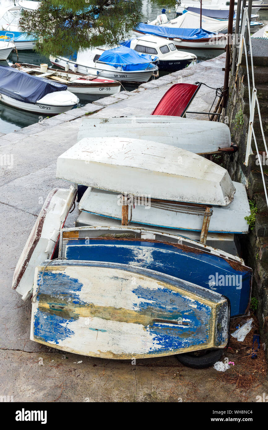 Overturned sail boat hi-res stock photography and images - Alamy