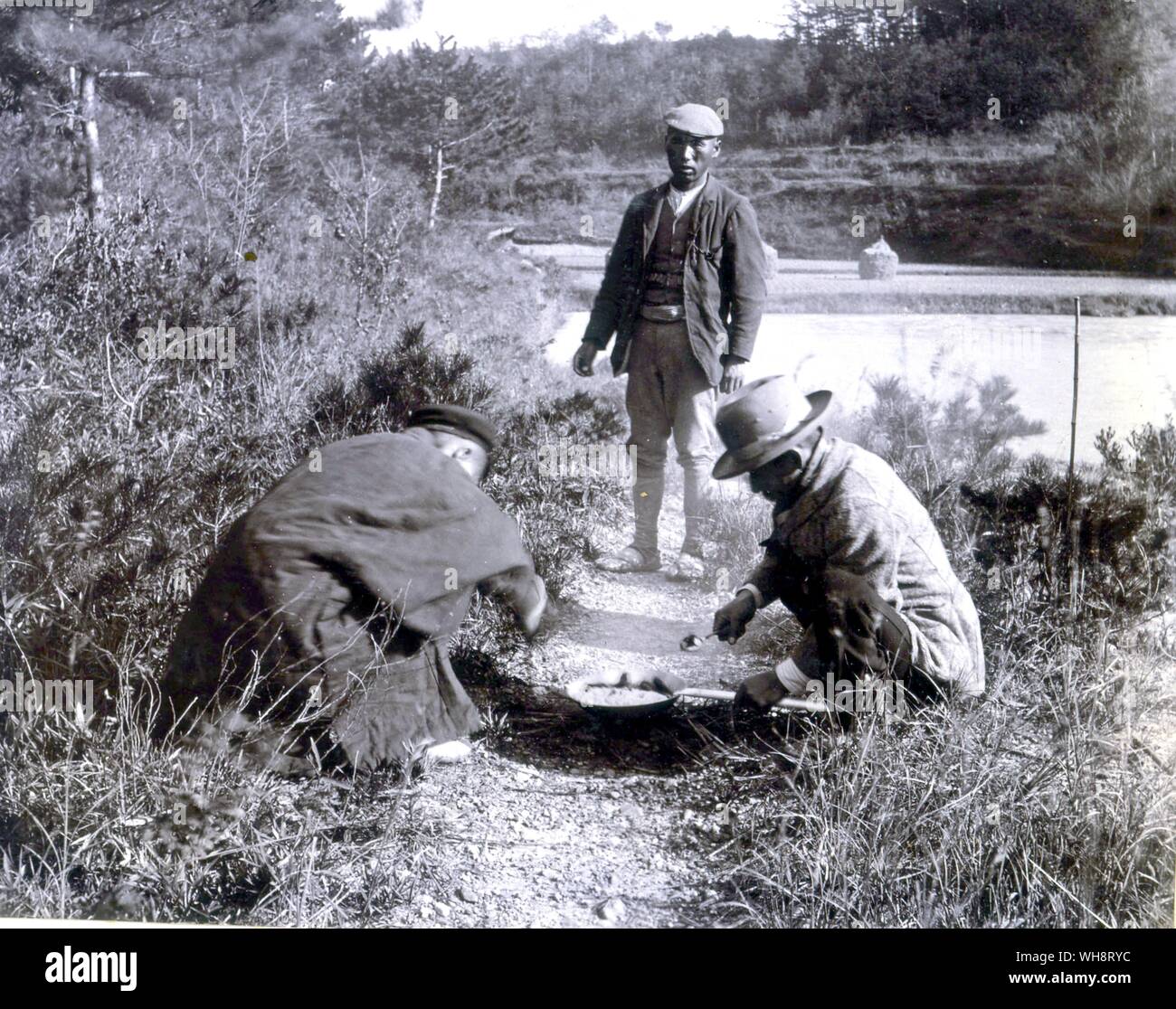 Cooking lunch. 1900 Stock Photo - Alamy