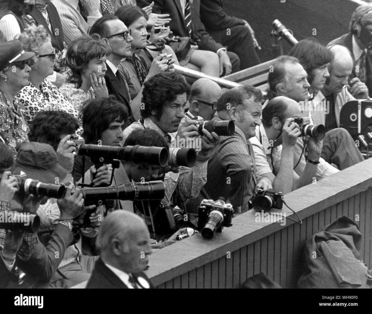 A battery of cameramen on the Centre Court at Wimbledon, including (l-r ...