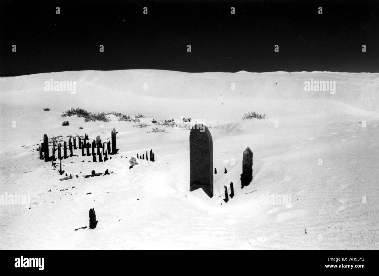Sand drifted over graves of men who died while building overland ...