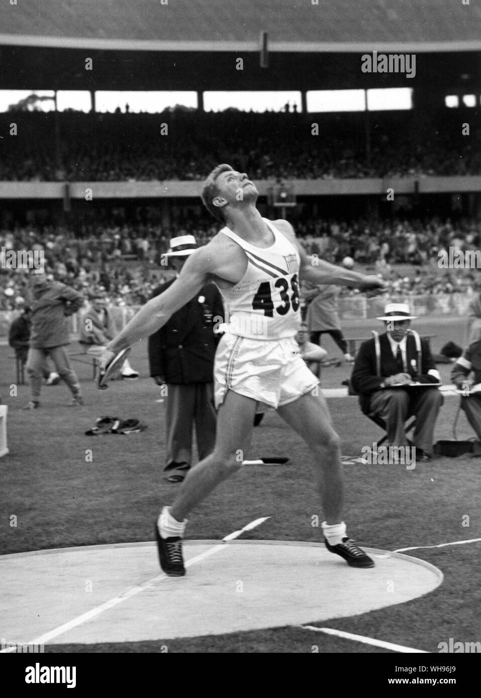 Aus., Melbourne, Olympics, 1956: Alfred Oerter (USA) slings the discus ...