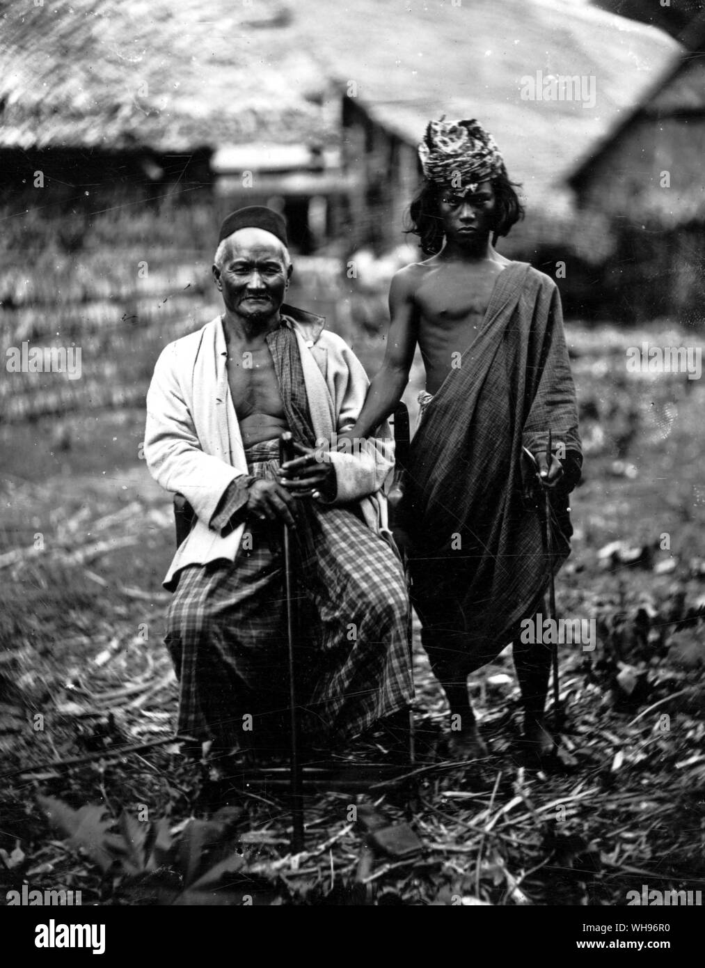 Aru Islands of Indonesia. Native chief with his son Stock Photo - Alamy