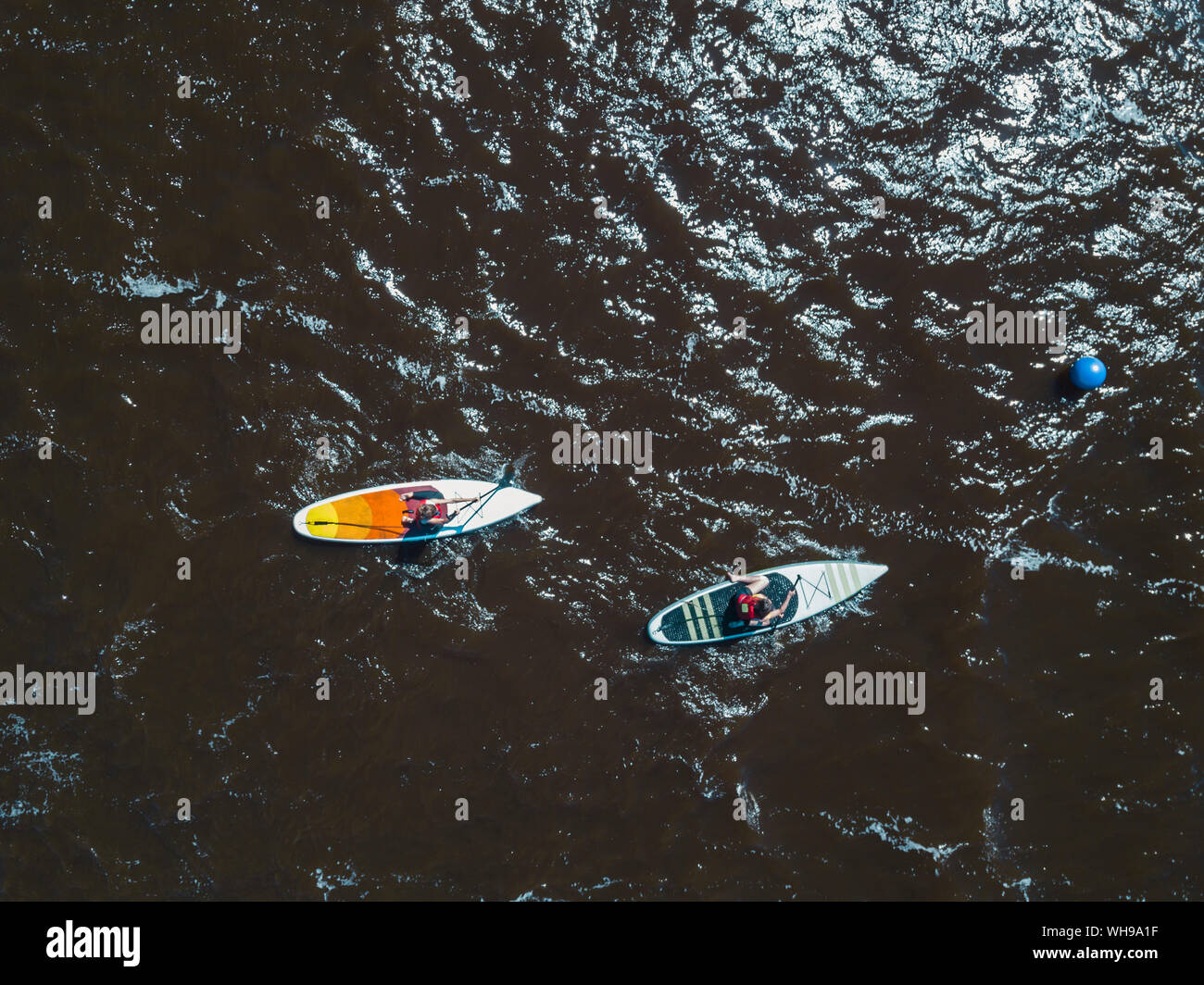 Aerial view of sup surfers hi-res stock photography and images - Alamy