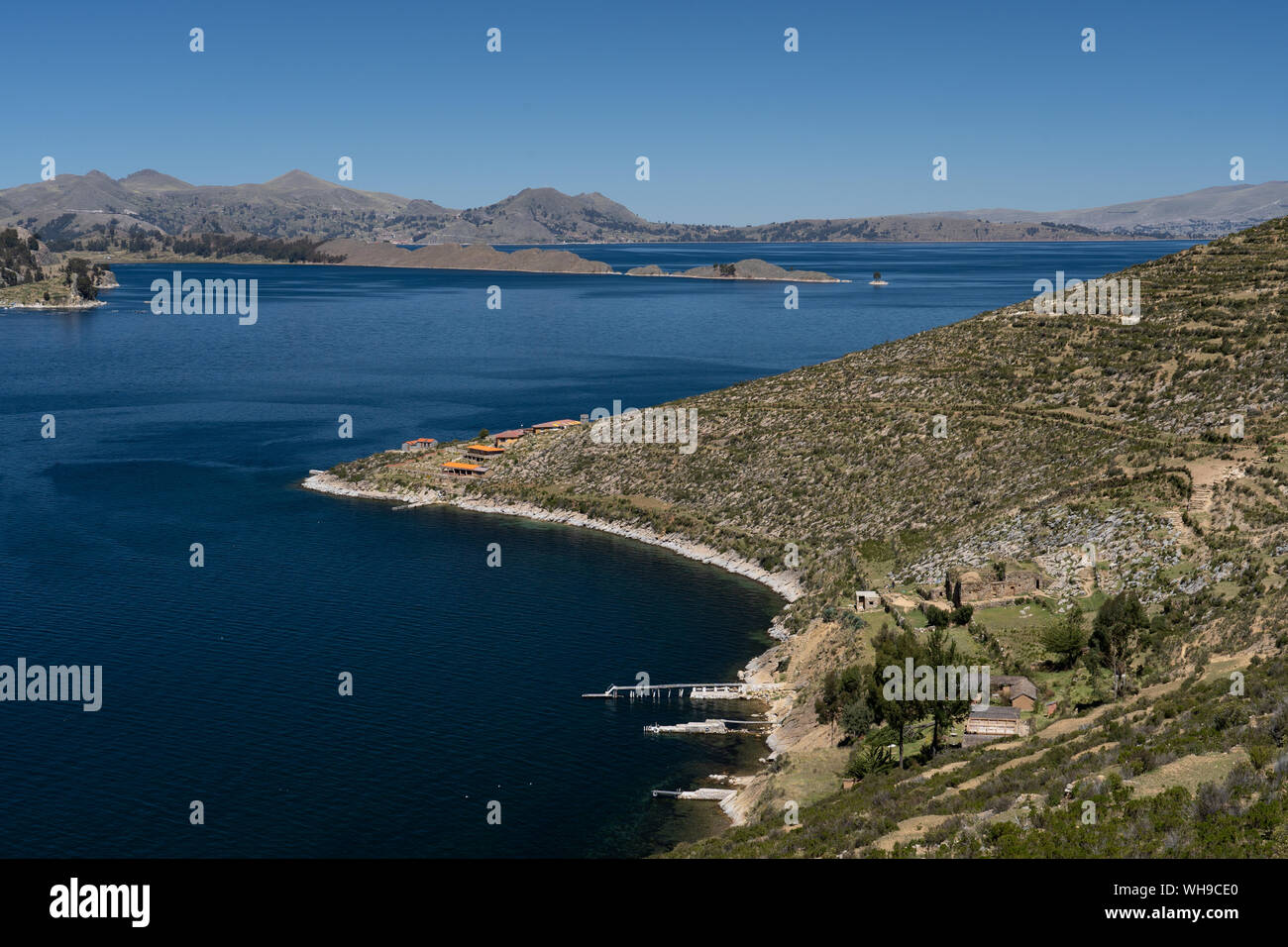 Aerial view from the top of Sun Island across deep blue Lake Titicaca ...