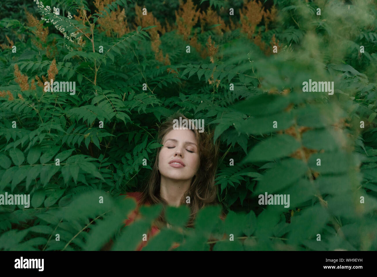 Woman emerging from light hi-res stock photography and images - Alamy