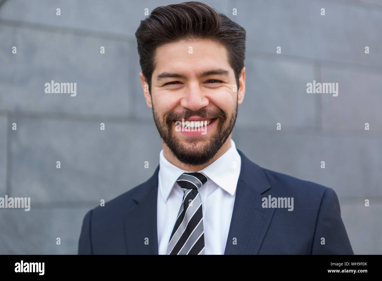 Bearded young man laughing hi-res stock photography and images - Alamy