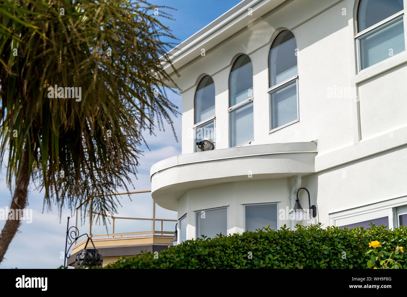 Peering over the balcony hi-res stock photography and images - Alamy