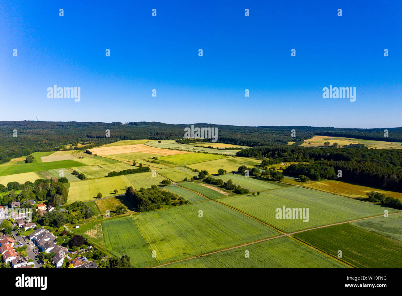 Aerial view over grain fields, meadows, woods and villages, Wetterau ...