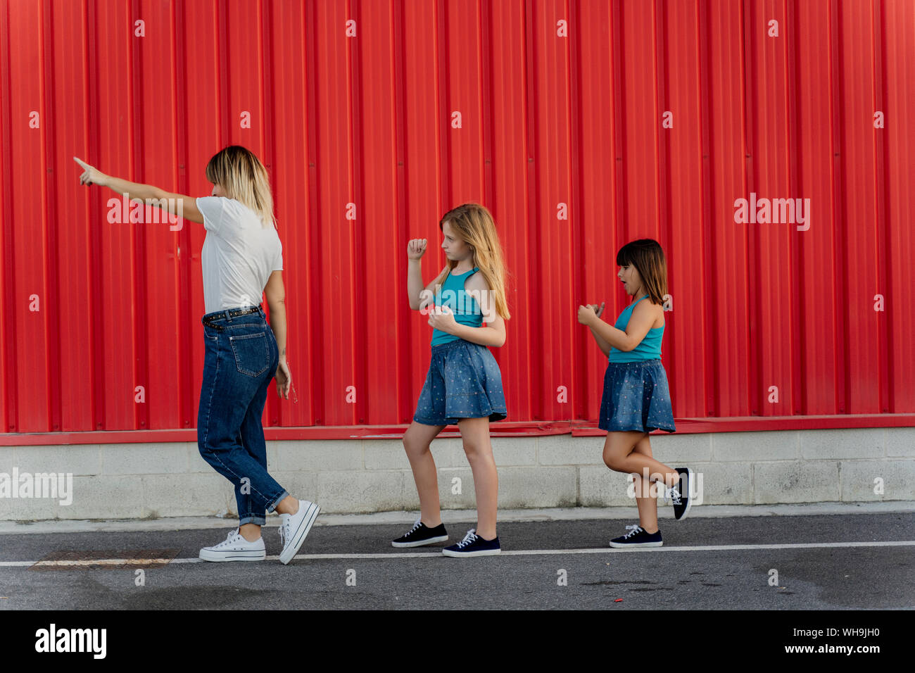 Girl following mother hi-res stock photography and images - Alamy