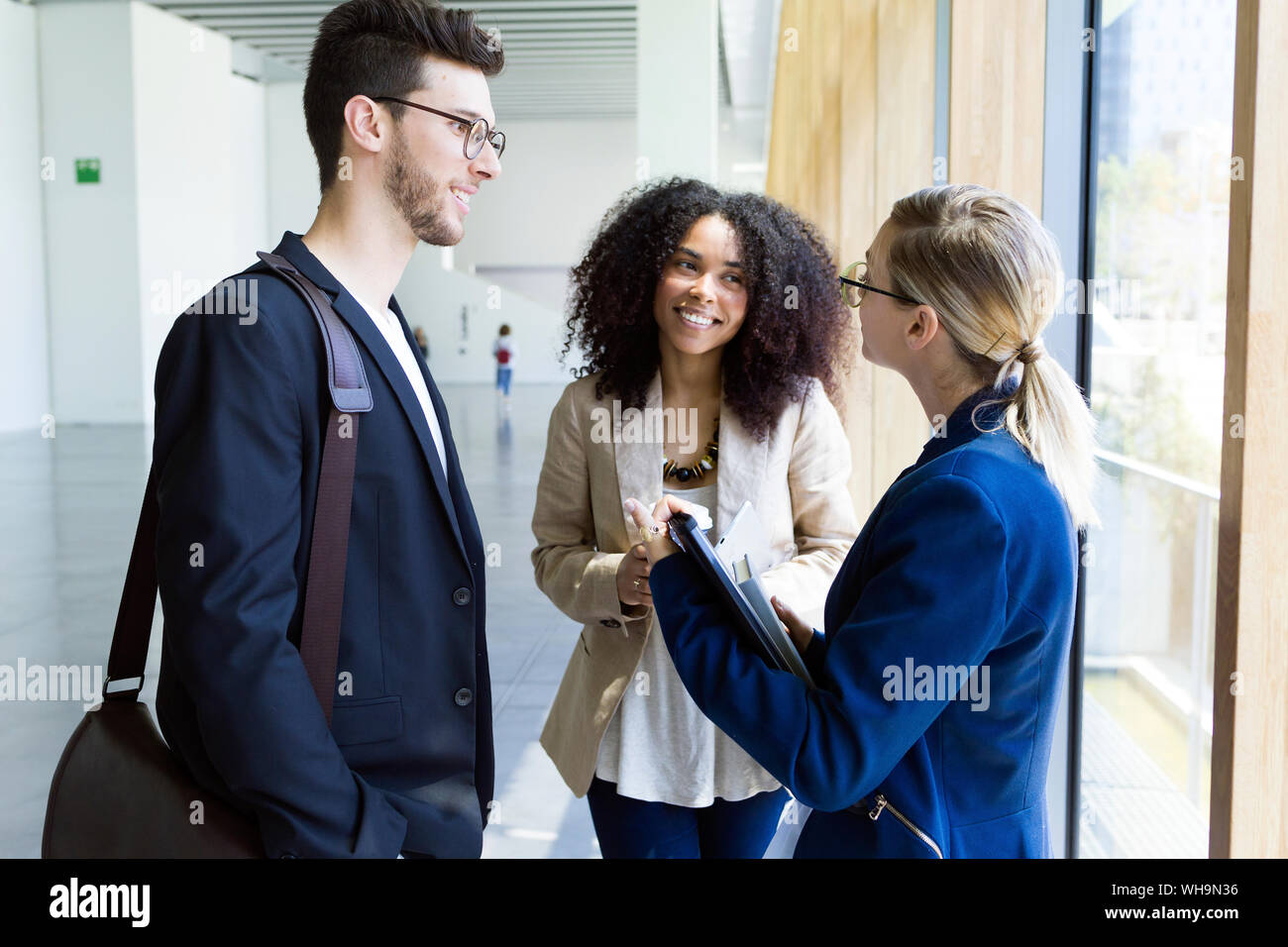Man woman in office hallway hi-res stock photography and images - Alamy