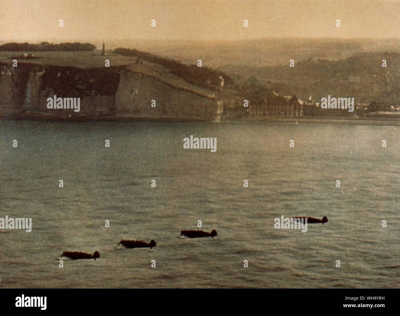 WW2: Battle of Britain. Painting of Spitfires flying over the sea with ...