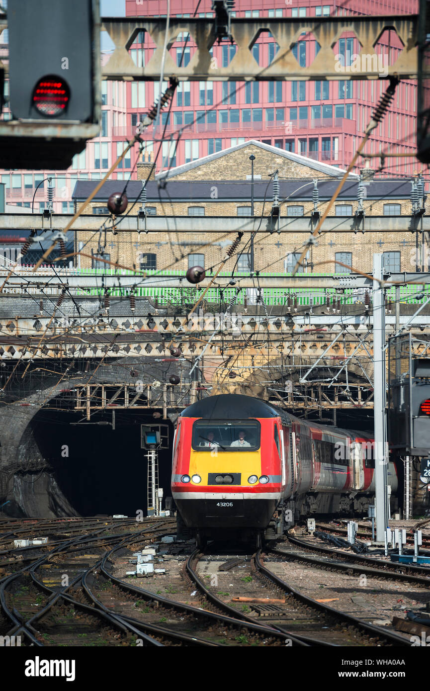 High speed train in LNER livery leaving King's Cross Railway Station ...
