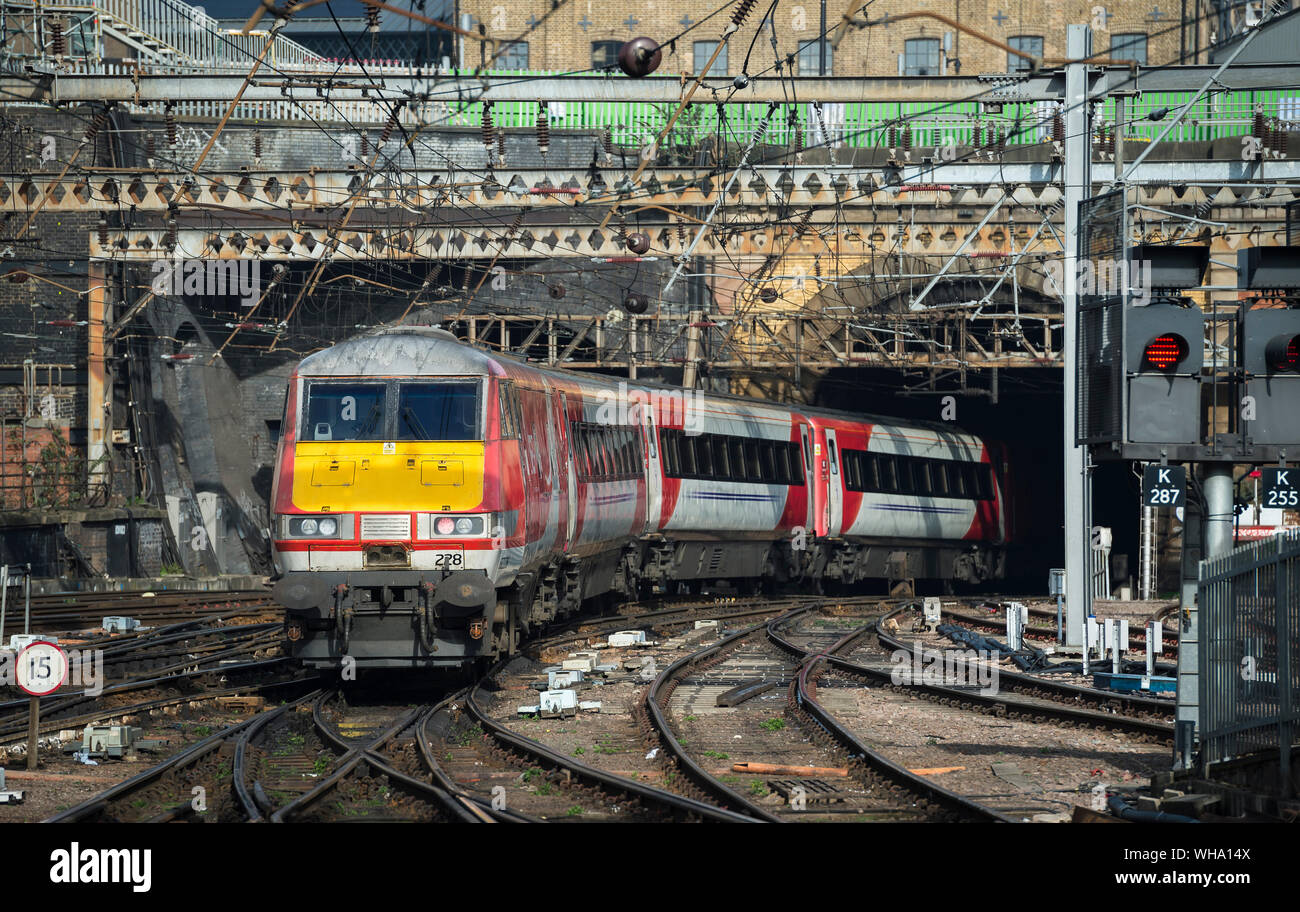 High speed train in LNER livery arriving at King's Cross Railway ...