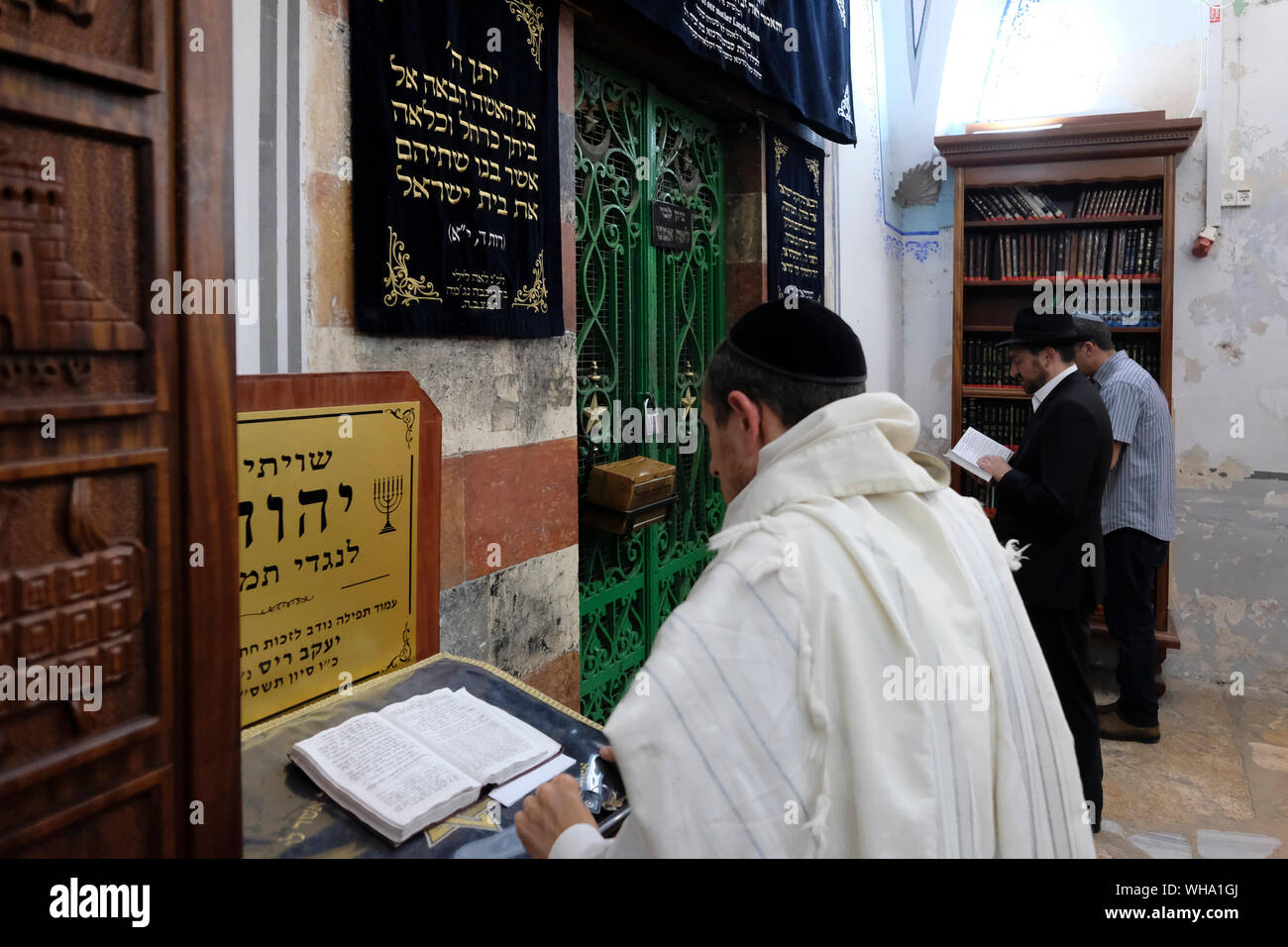 Jews praying inside prayer hall hi-res stock photography and images - Alamy