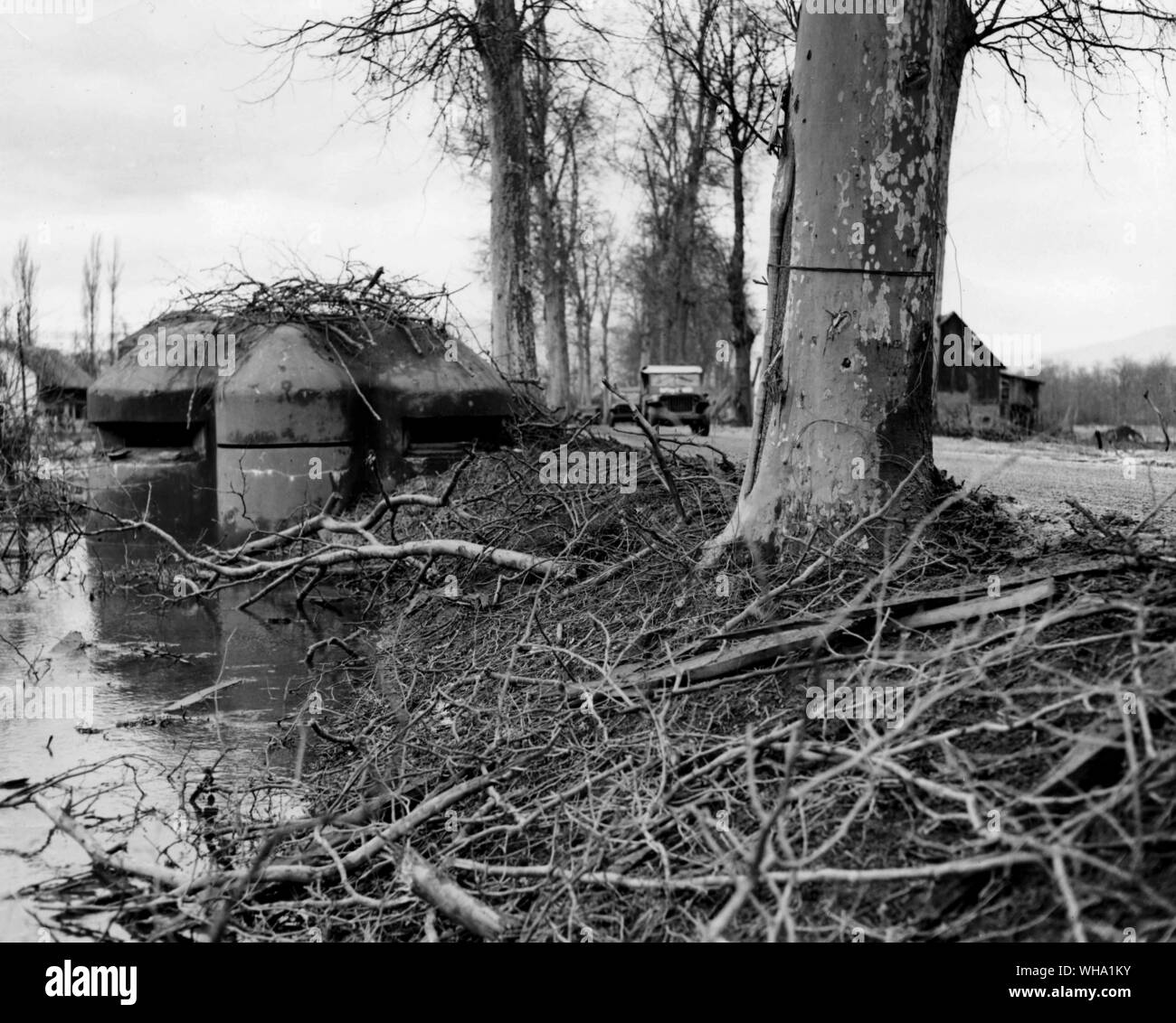 WW2: Camouflaged pillbox guarding the highway, was strongly defended by ...
