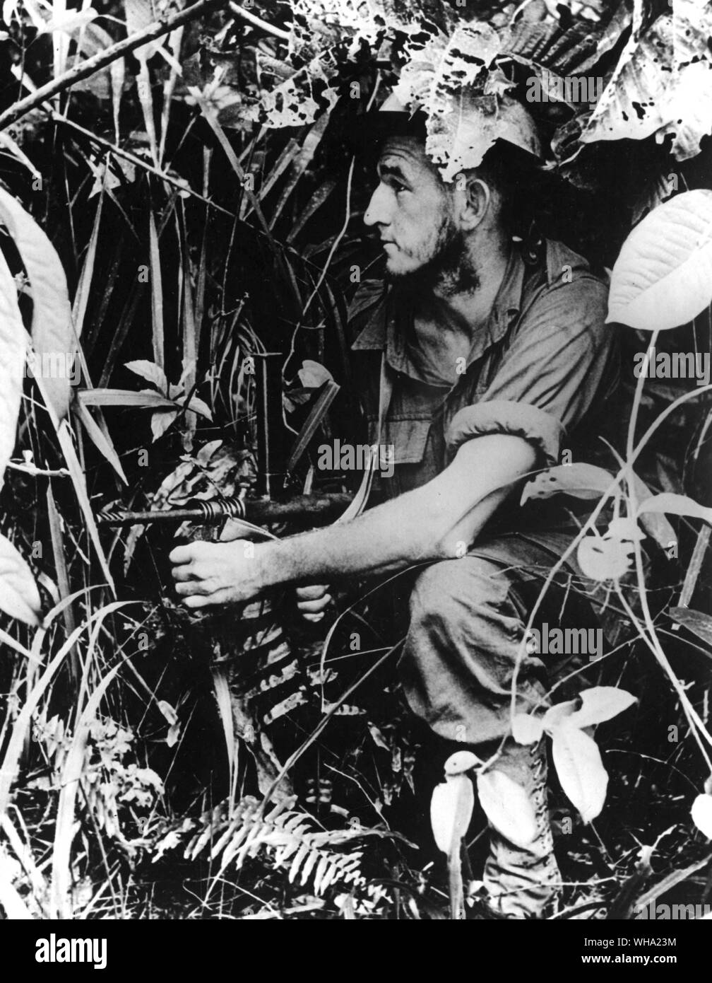 WW2: An Australian with an Owen Gun in the dense jungle. Sanananda area ...