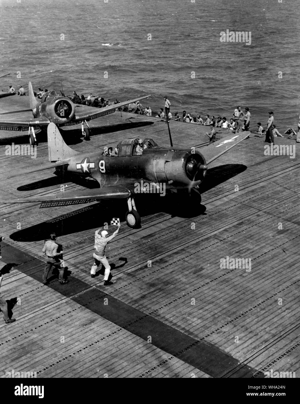 WW2: SBD taking off from the deck of USS Yorktown during a raid on a ...