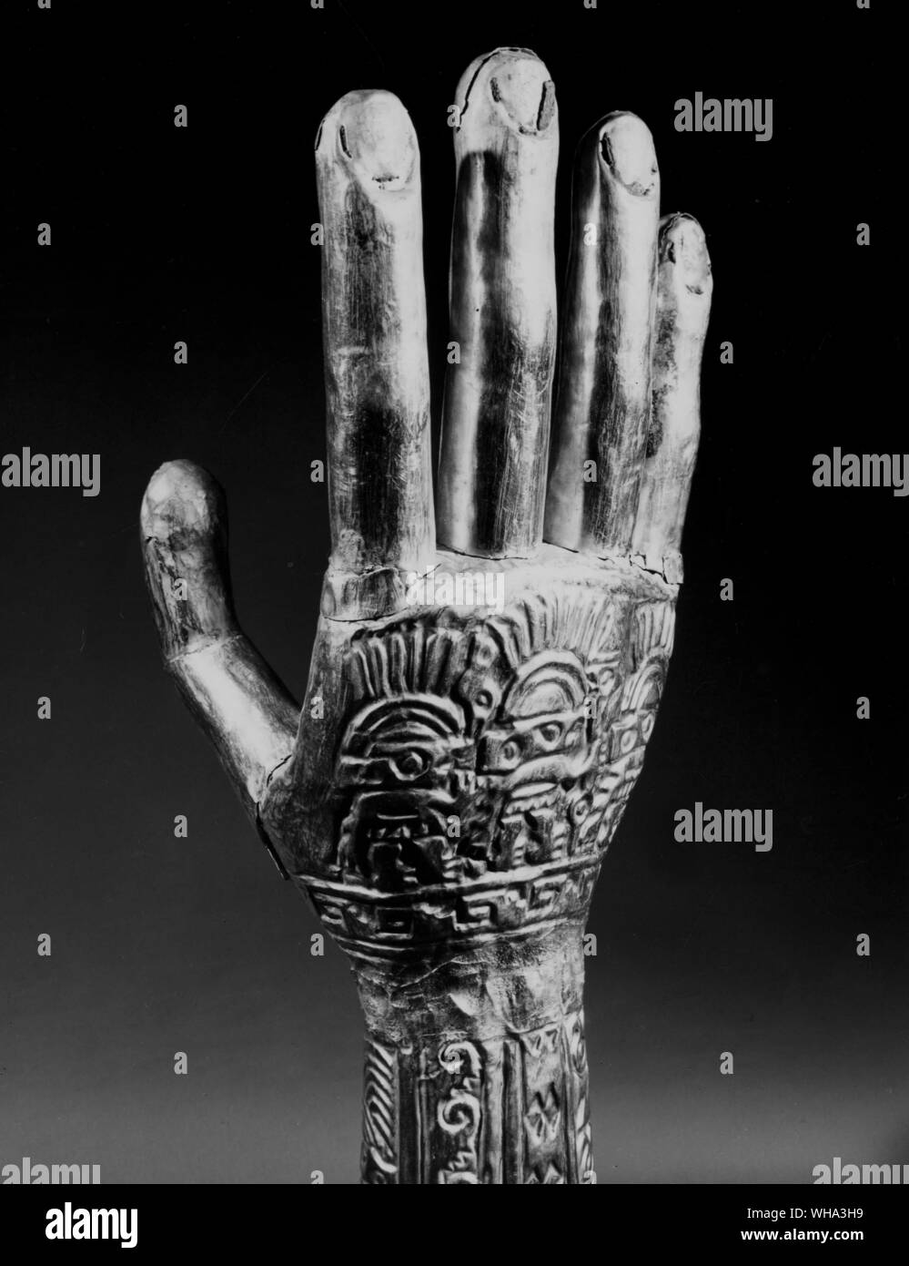 Peruvian Gold Exhibition. Pair of hands Stock Photo - Alamy