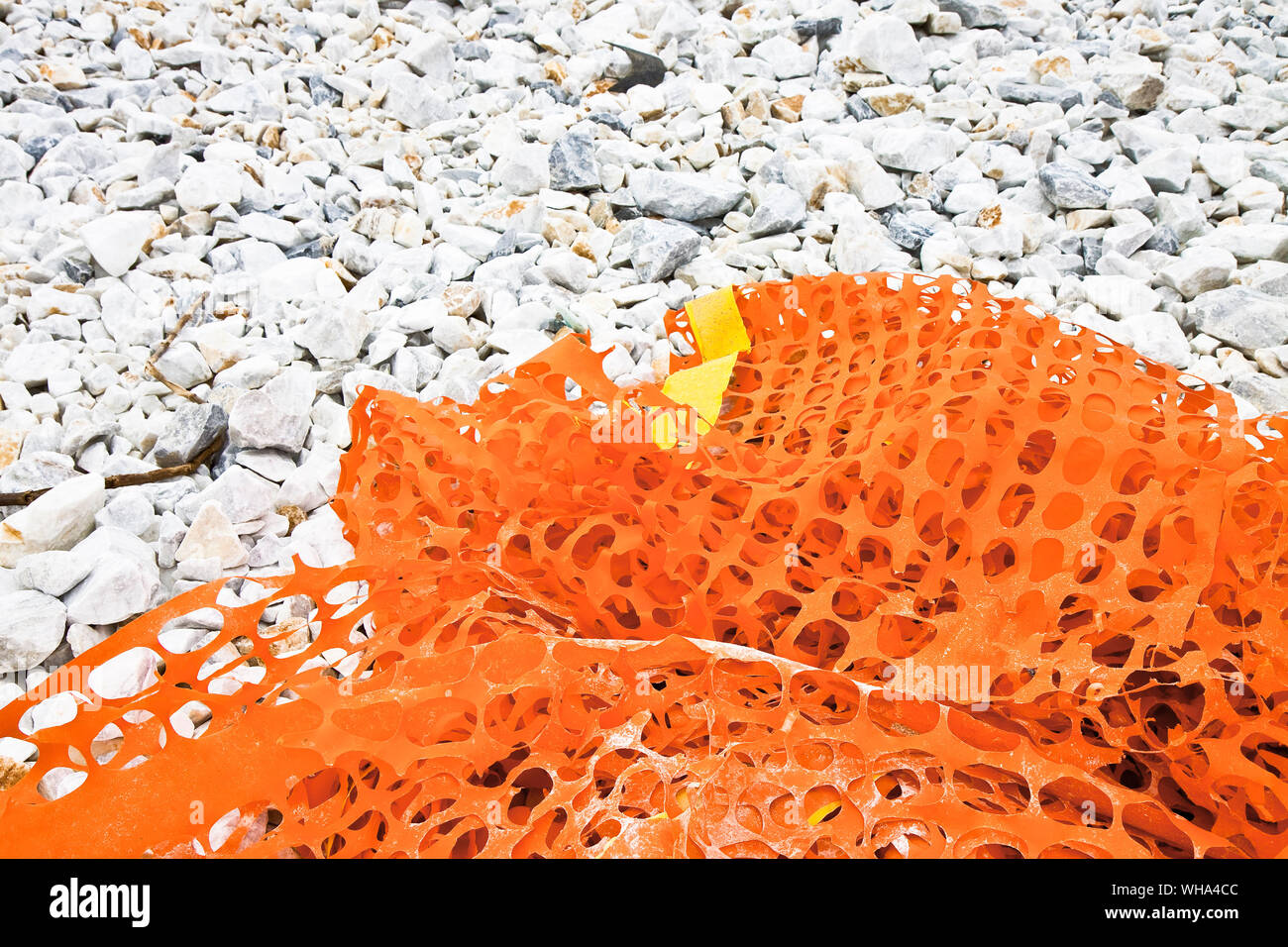 Safety orange plastic grid for construction site Stock Photo - Alamy