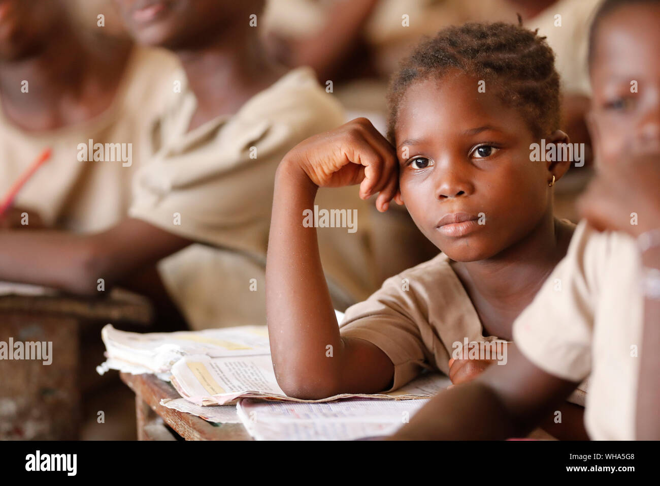 African primary school, young girl in the class room, Lome, Togo, West ...