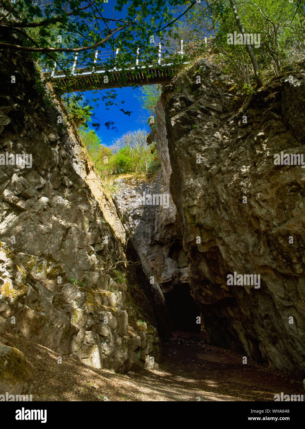A modern footbridge carries the Leete Path over the Devil's Gorge ...