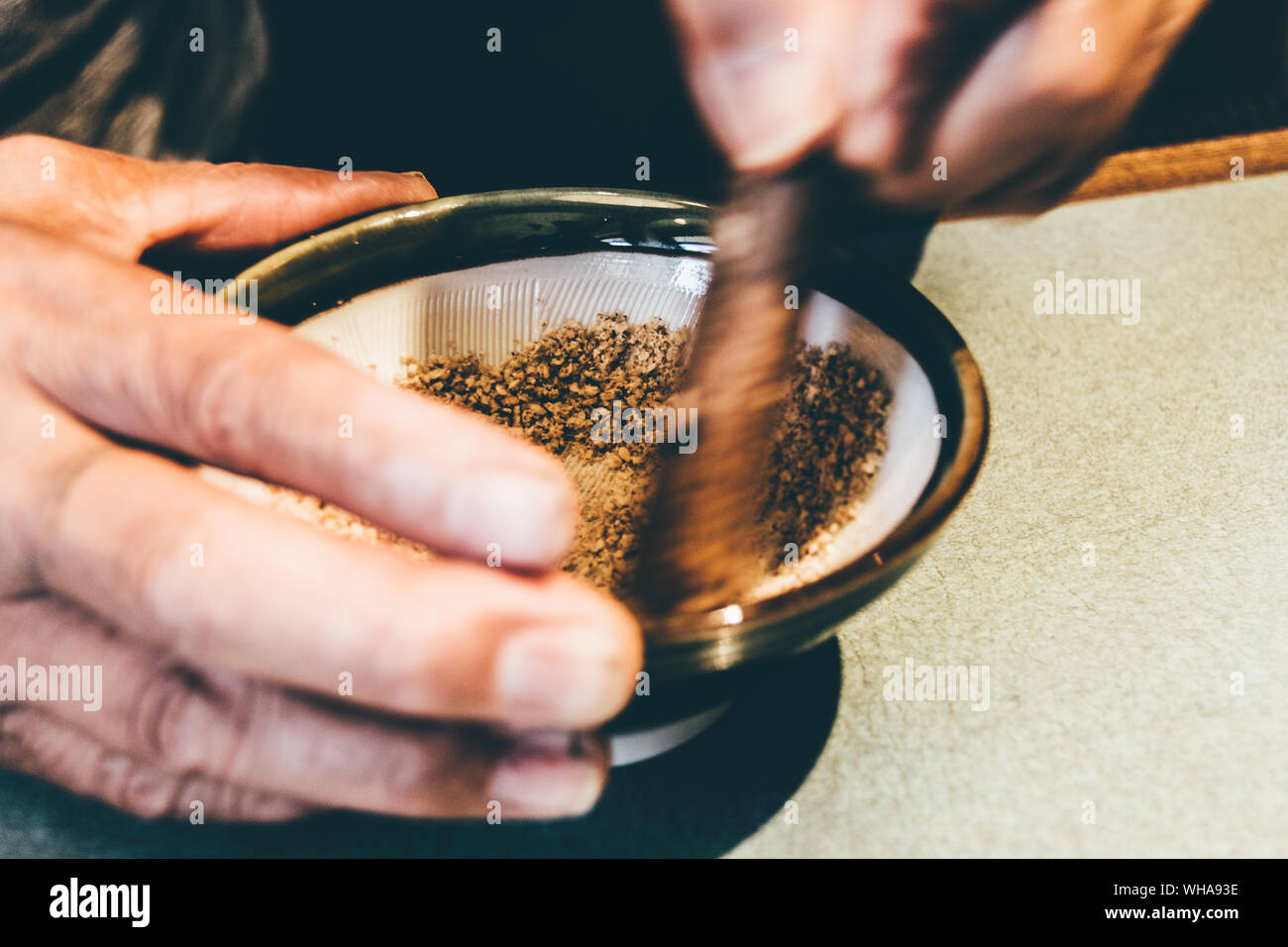 Hand grinding hi-res stock photography and images - Alamy