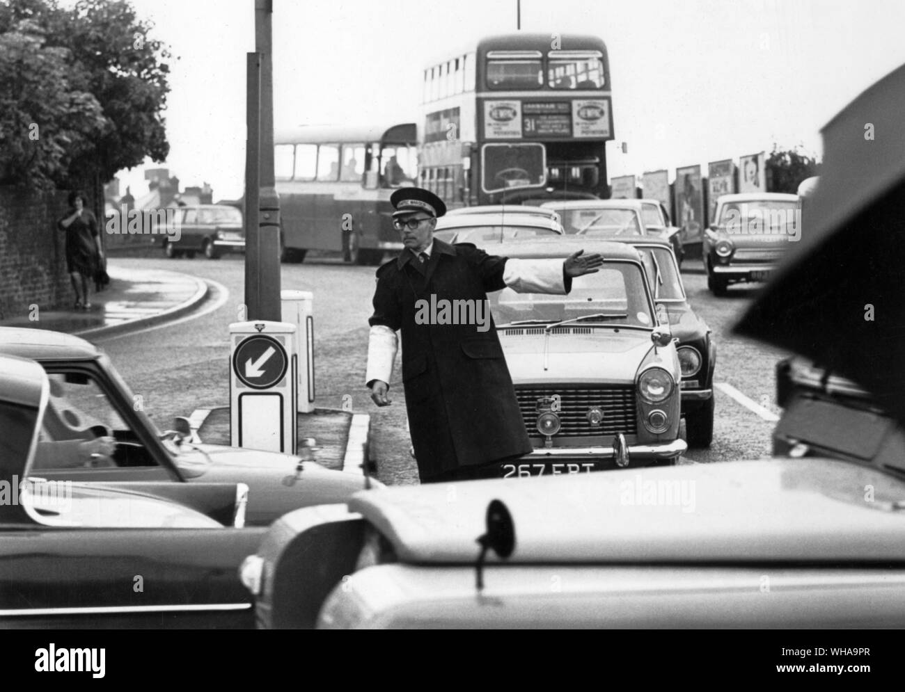 Traffic warden on traffic control duties at Guildford Surrey Stock ...