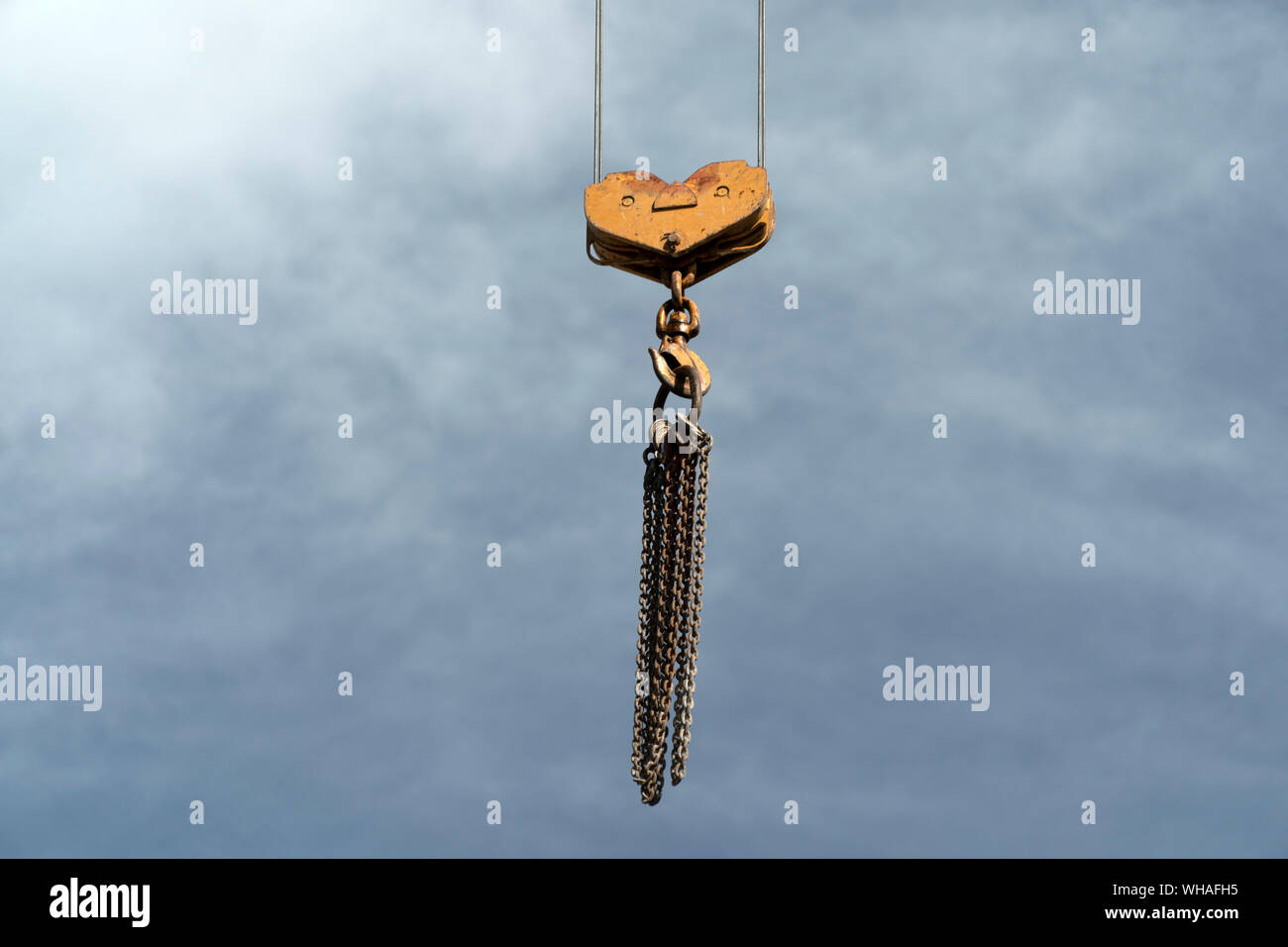 crane chain detail in sky background detail Stock Photo - Alamy