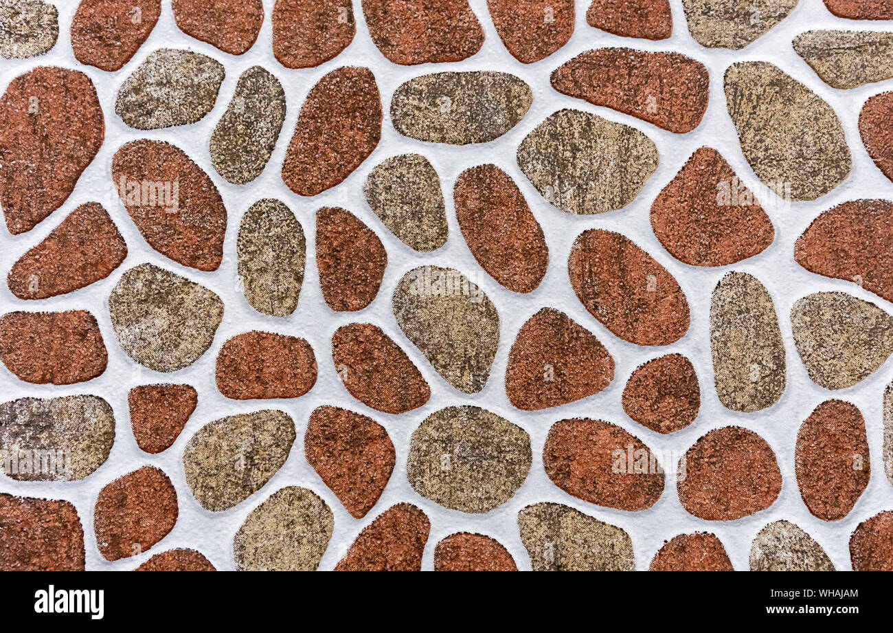 Porcelain tile with a pattern of stones of different shapes and sizes ...